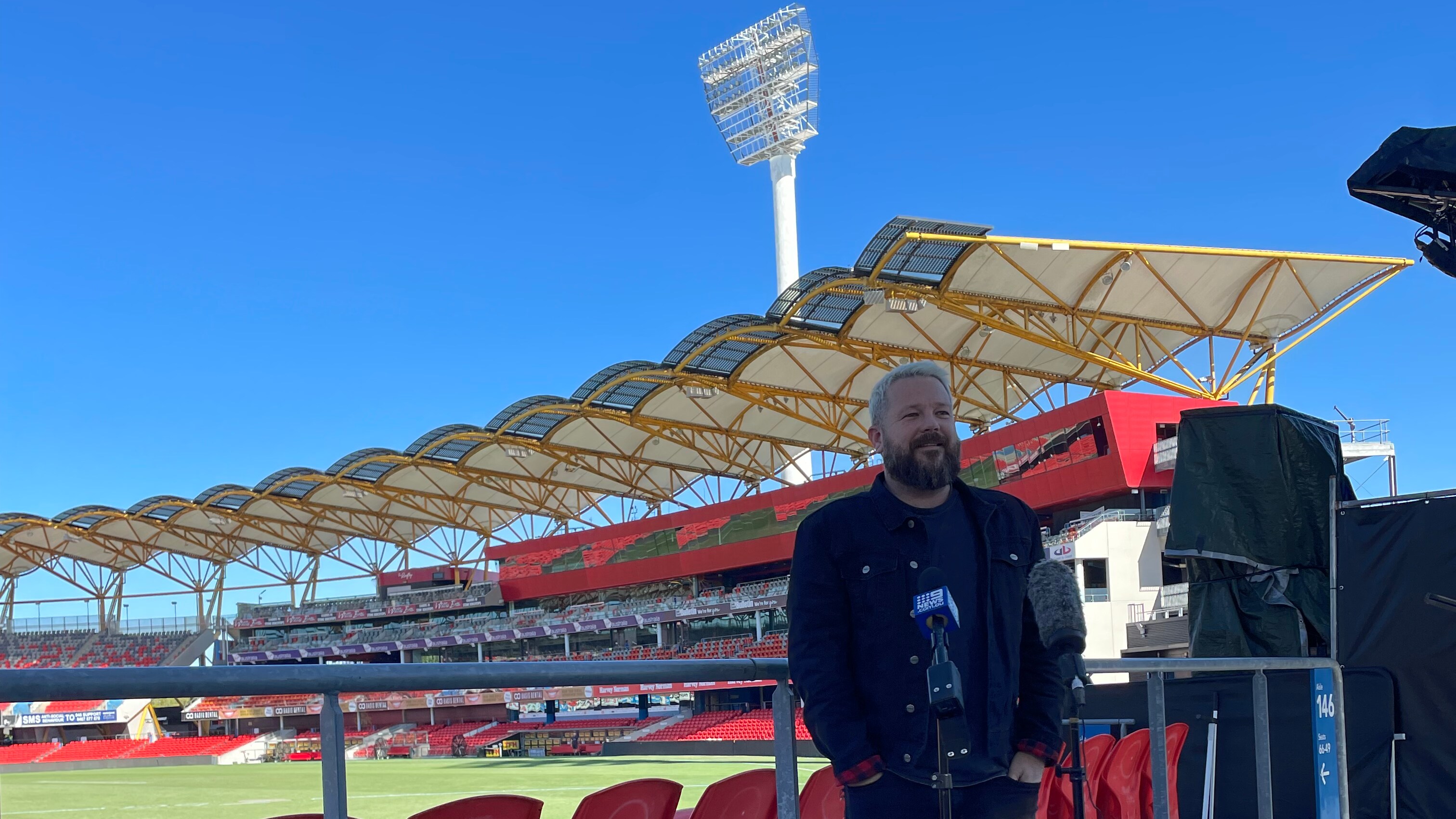 SUNS fan Tom Busby “pumped” to perform at Metricon Stadium