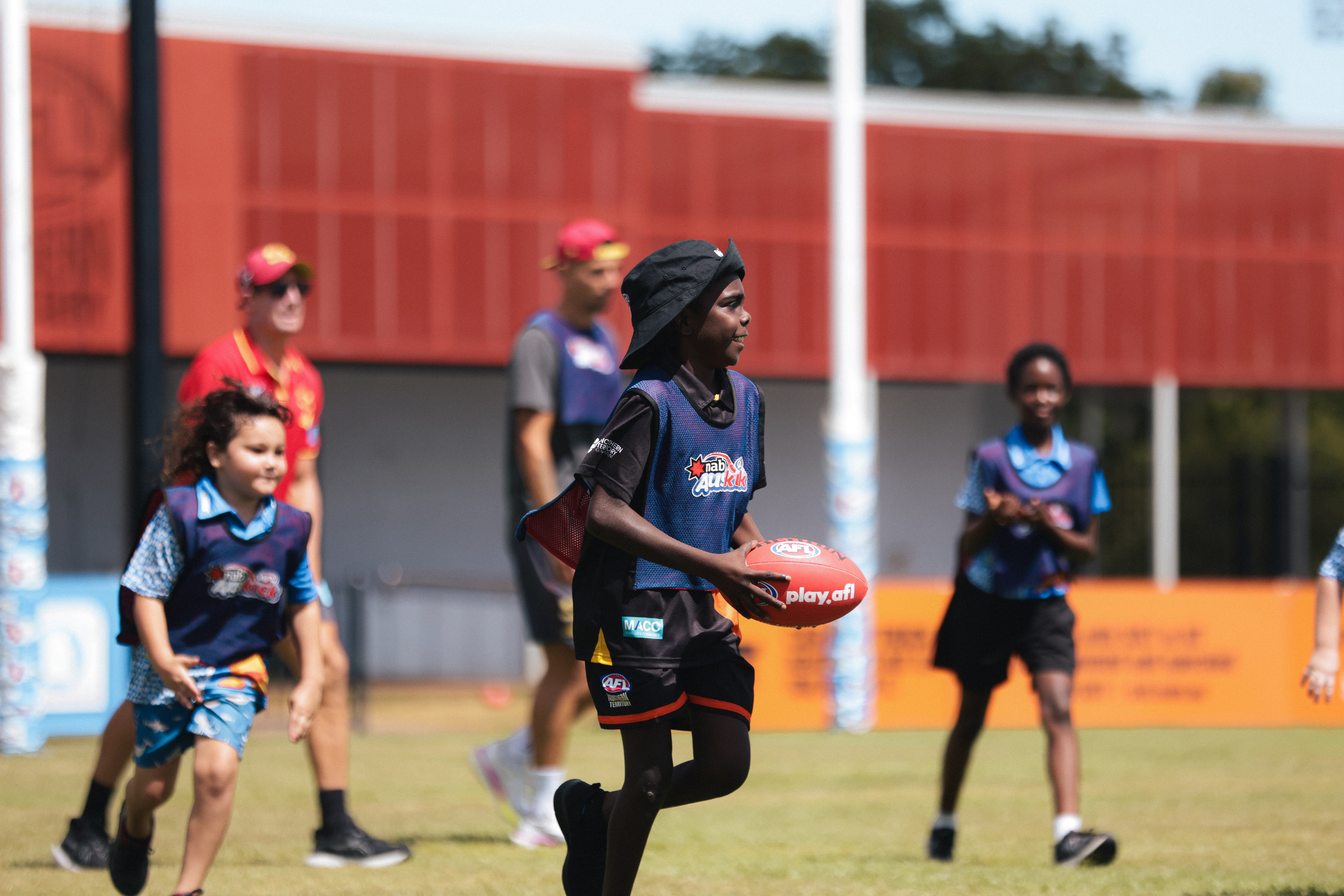 SUNS add star power to AFLNT's footy program for remote communities