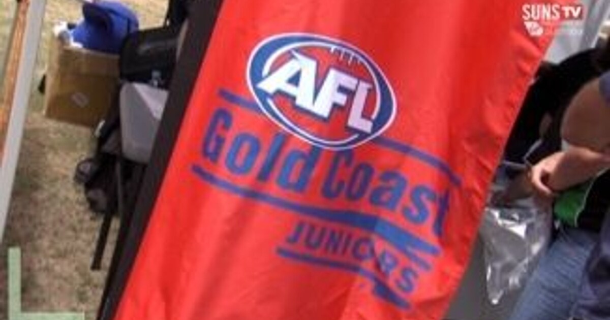 Footy fever takes over as hundreds sign-on at Metricon Stadium